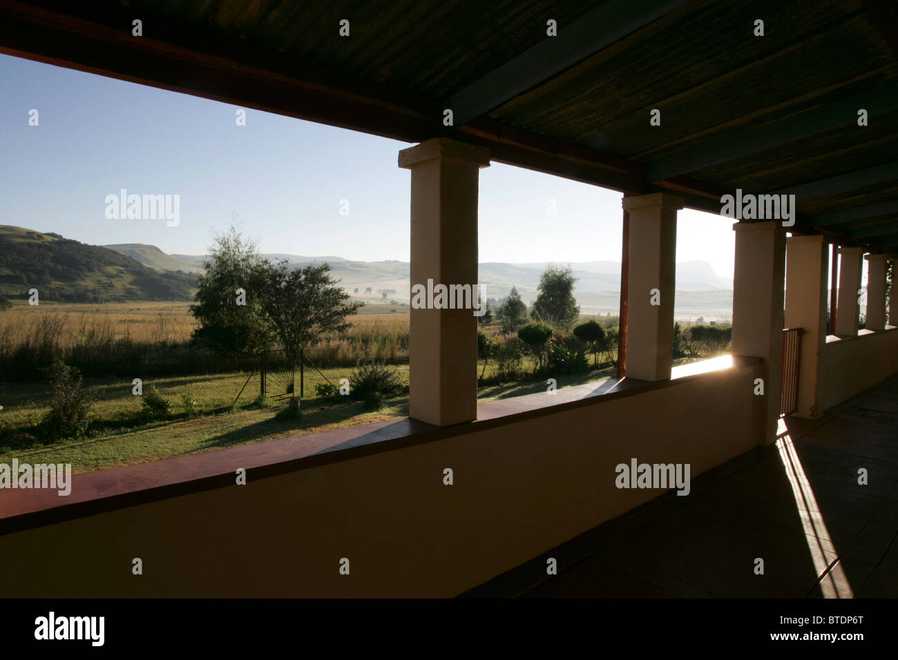 A picturesque view taken from the veranda of an old farm house Stock ...
