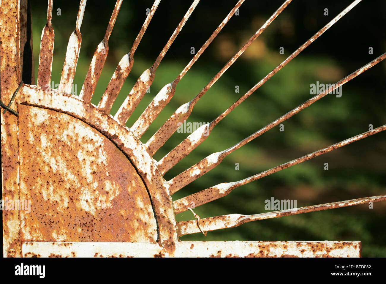 Rust on an iron gate with a radial pattern Stock Photo - Alamy