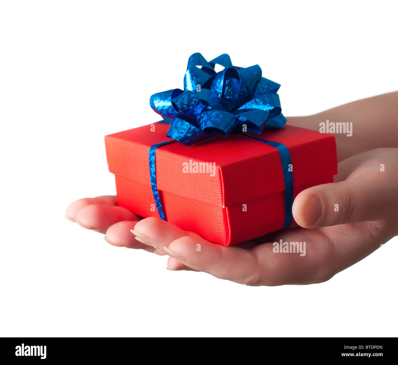 Hands giving a gift isoated Stock Photo - Alamy