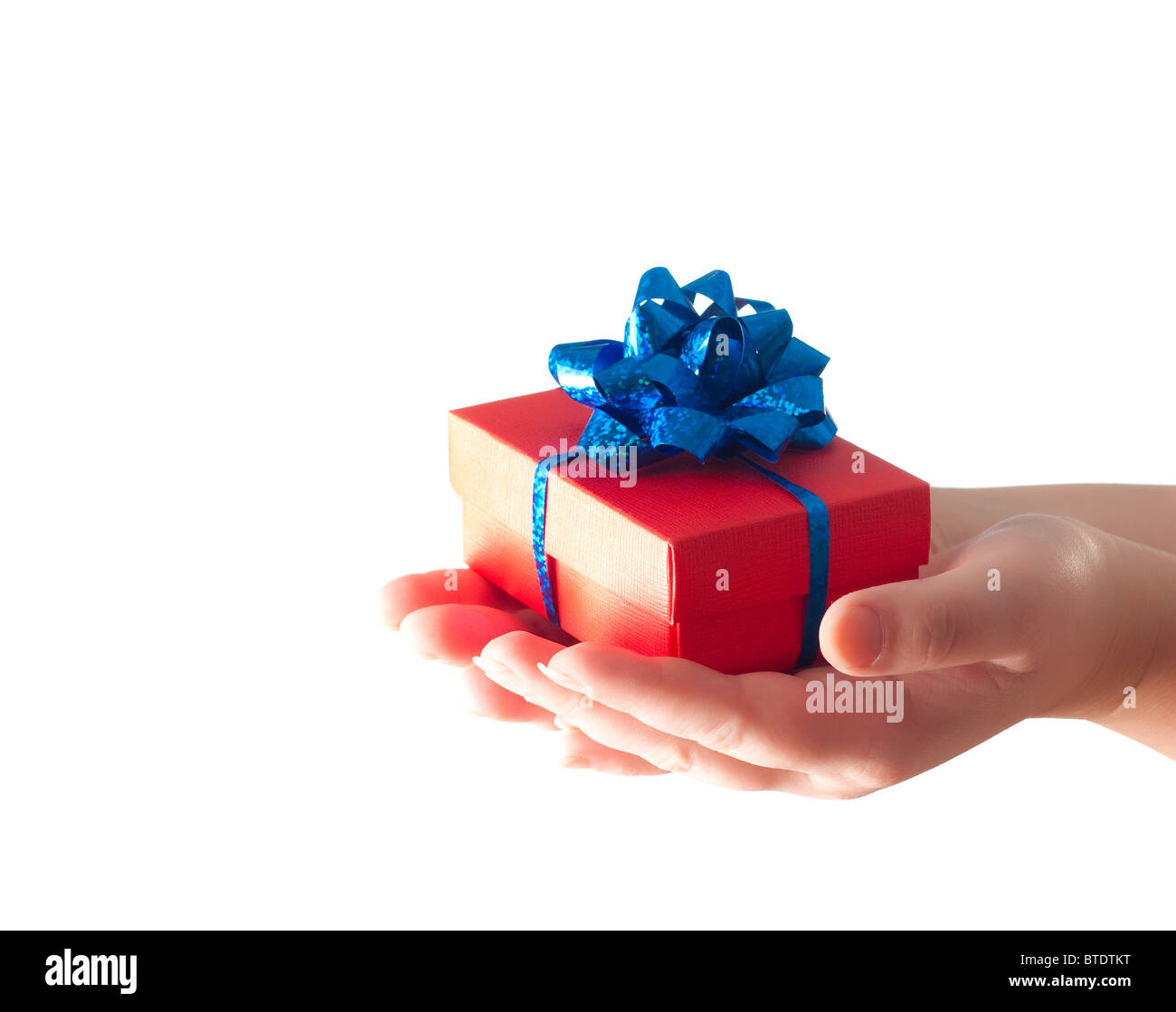 Hands giving a gift isoated Stock Photo - Alamy