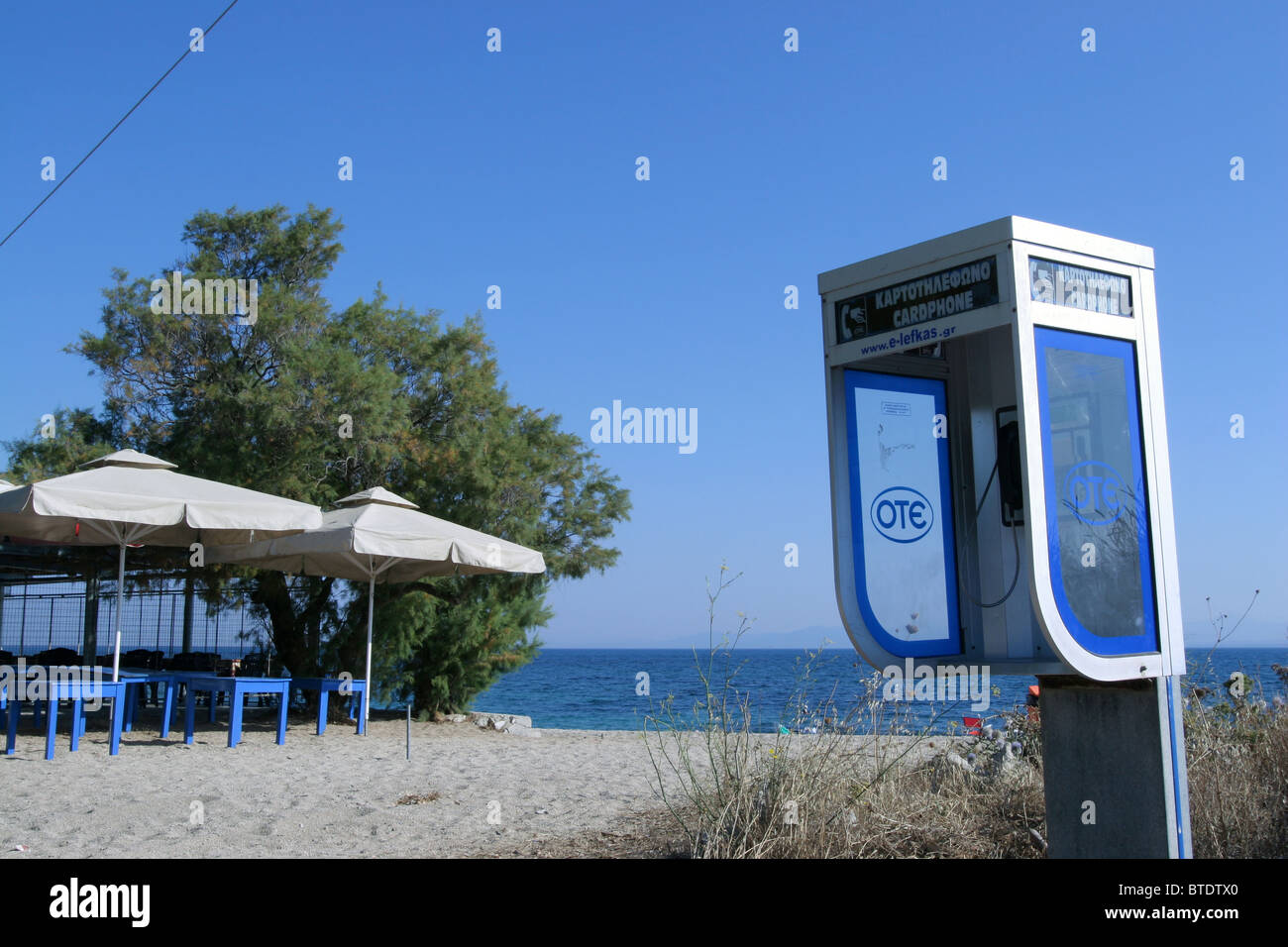 telephone phone booth on the beach in Lefkas lefkada Greece no people ...