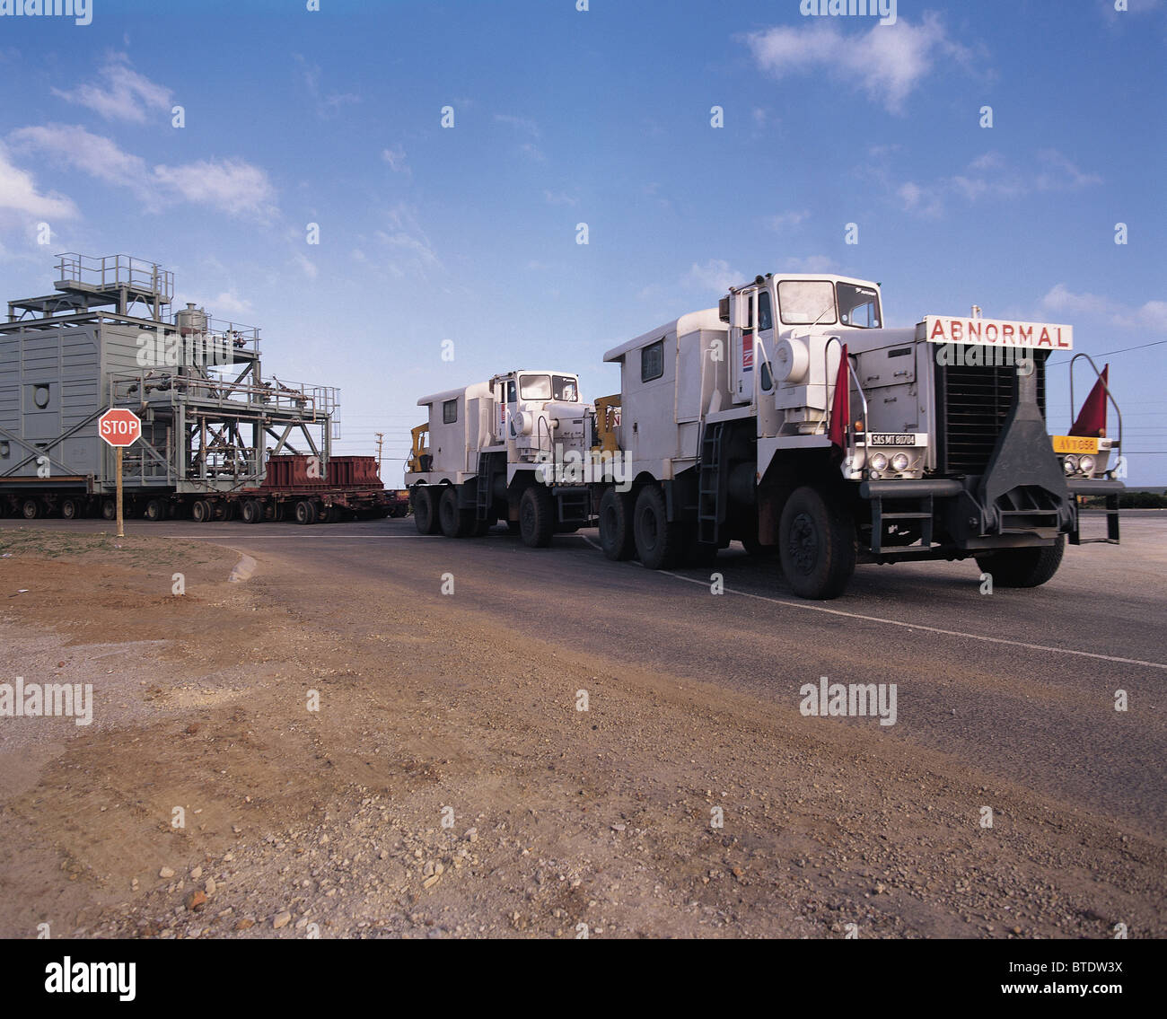 A convoy of heavy duty trucks Stock Photo - Alamy