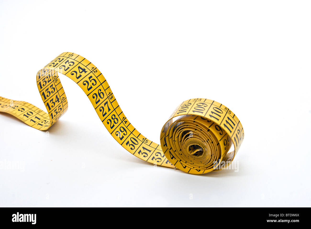 Measure tape isolated on white background Stock Photo - Alamy