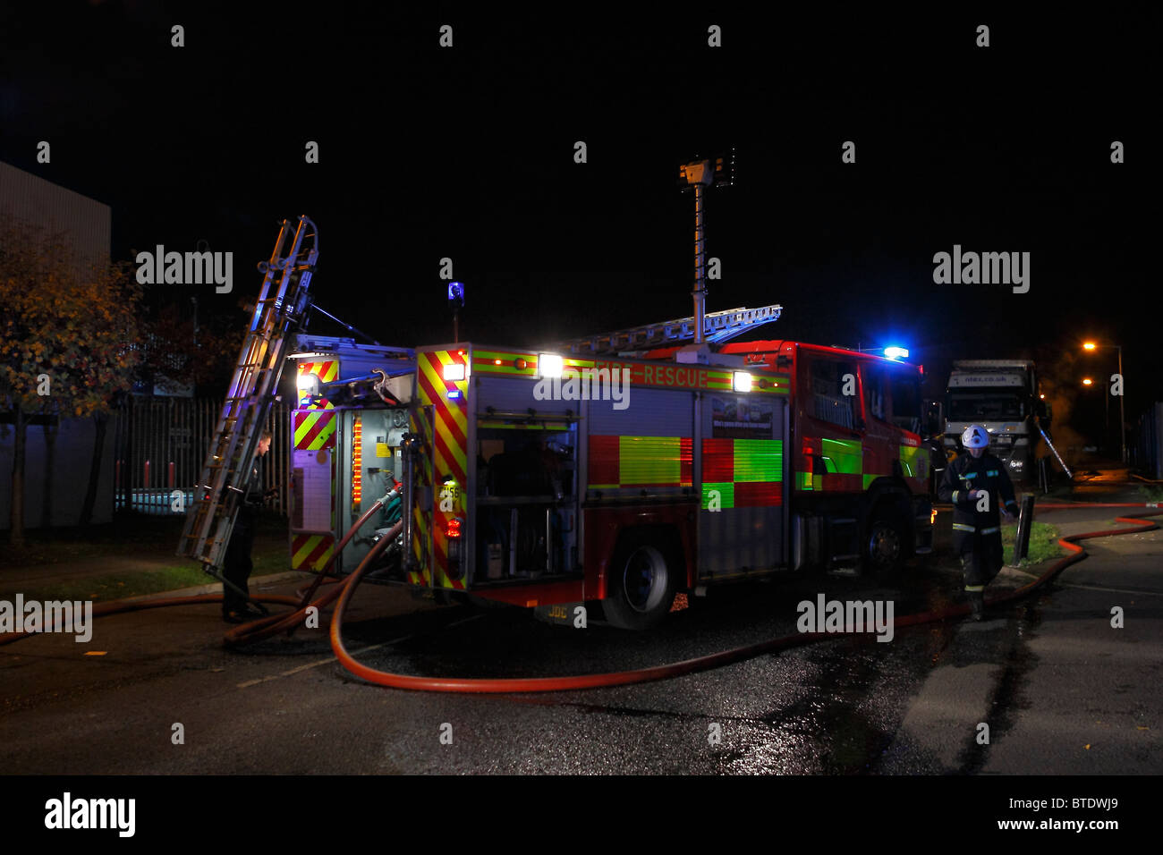 Fire engine at night Stock Photo - Alamy