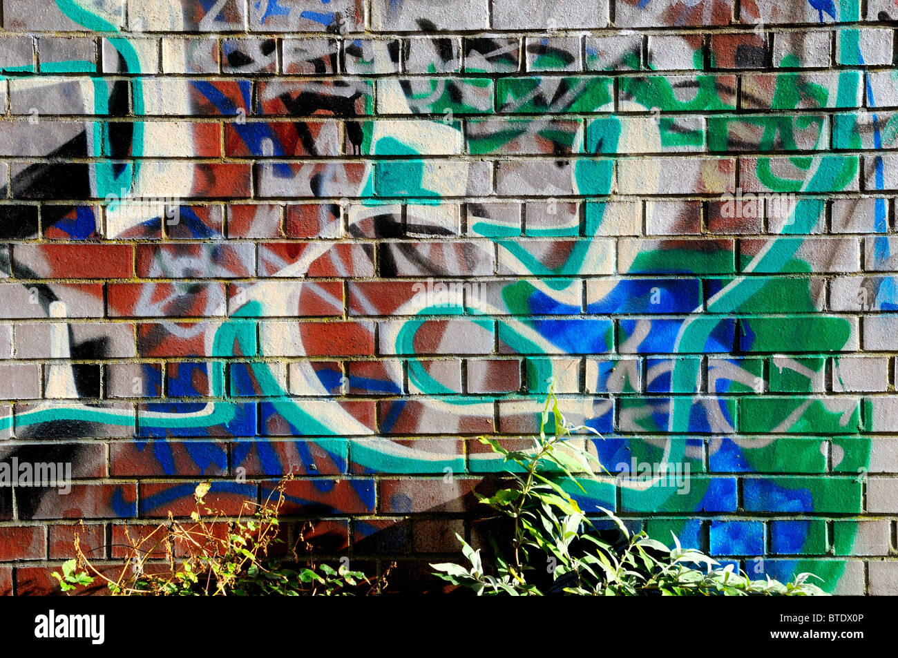 Graffiti on brick wall Stock Photo - Alamy