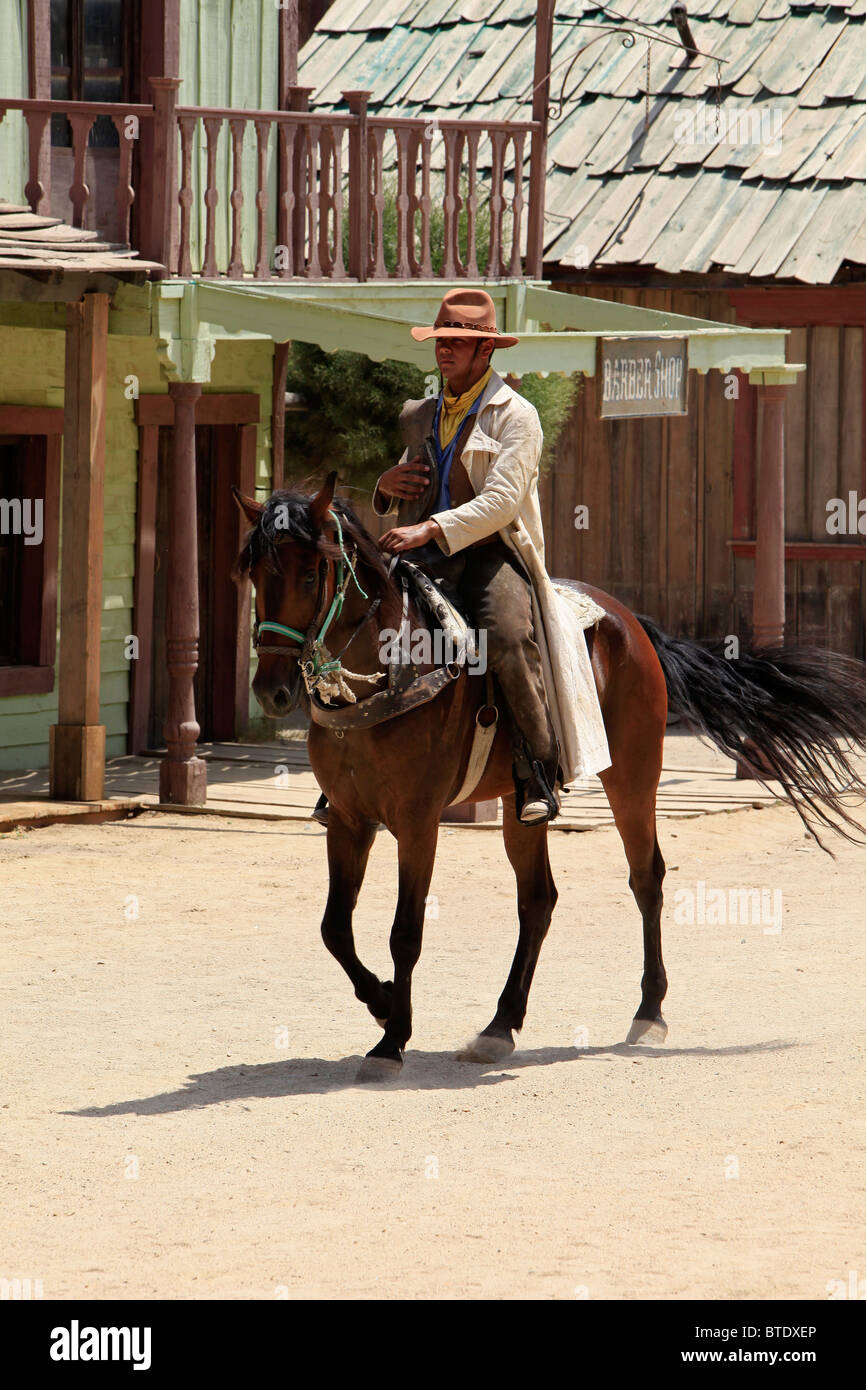 A gunfighter riding into town during a re-enactment at Fort Bravo ...