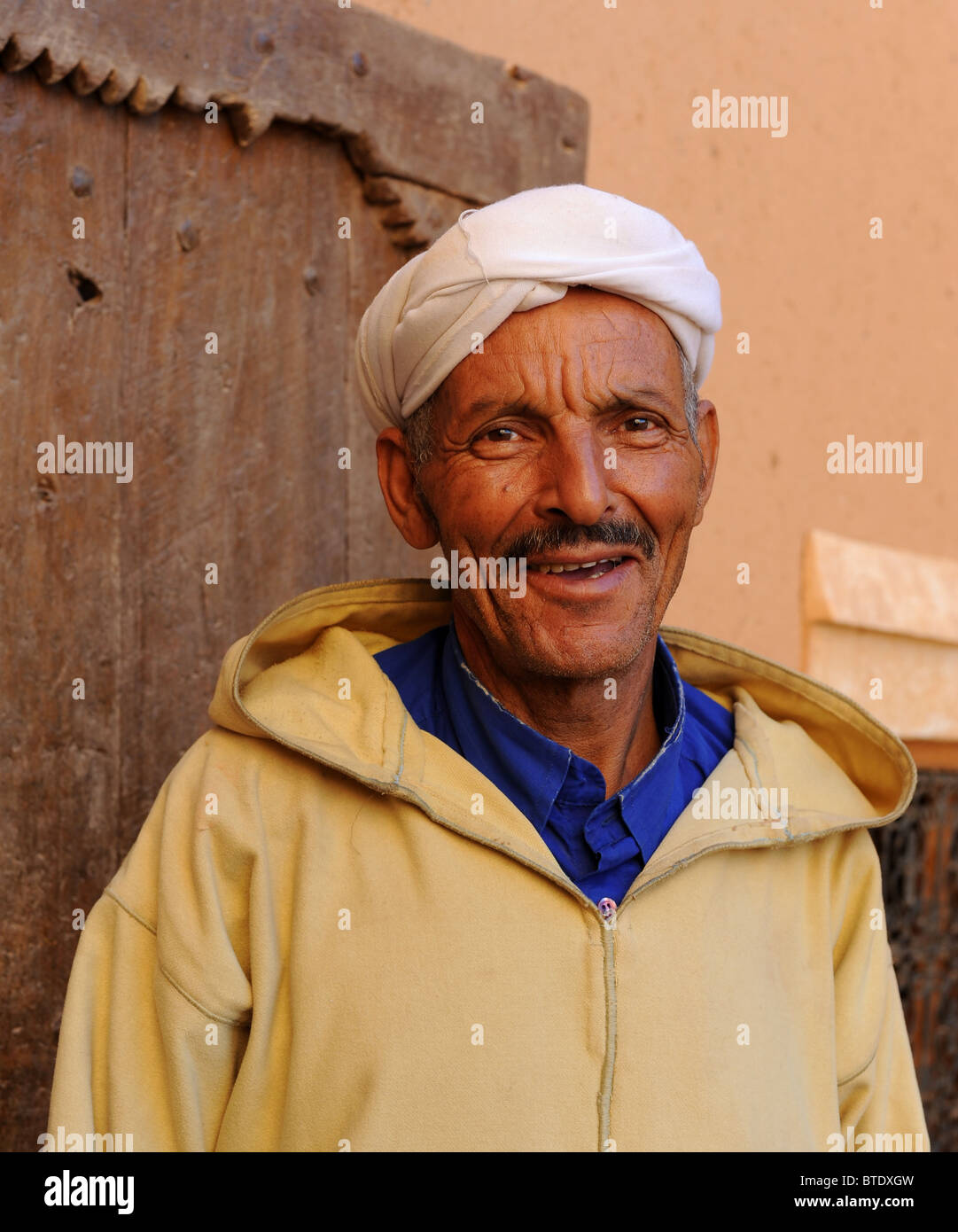 Moroccan man poses for photo in Knob, Southern Morocco Stock Photo - Alamy