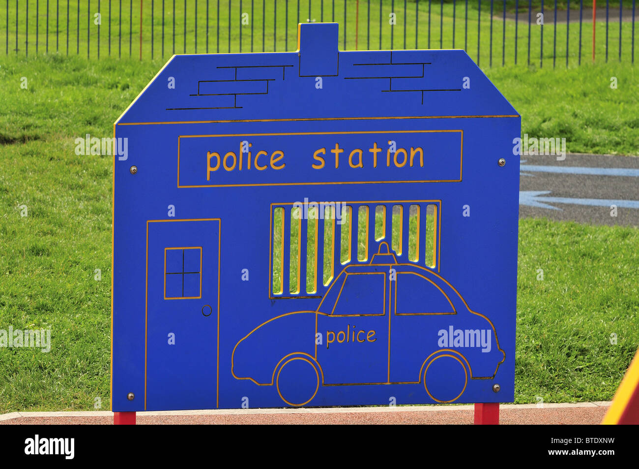 Children's play ground wooden cut out blue Police station Stock Photo ...