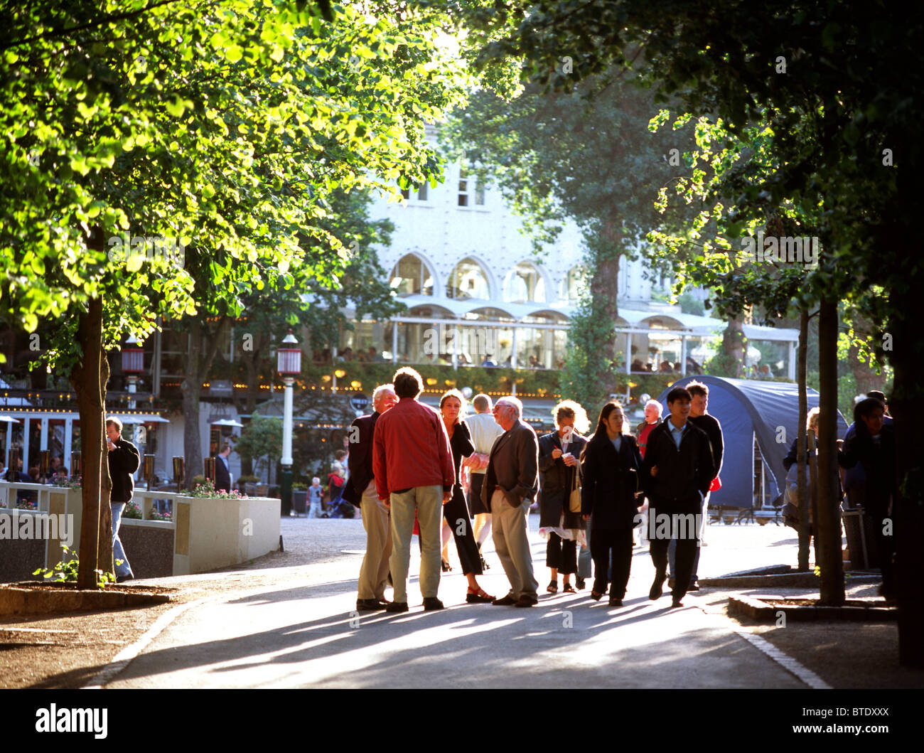 People Strolling & Chatting Stock Photo - Alamy
