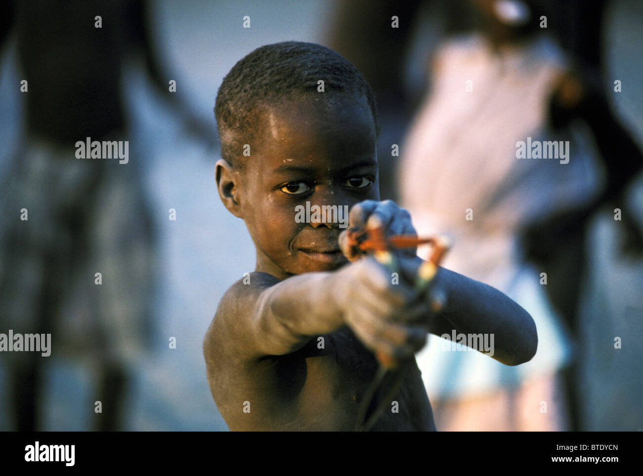 Child with catapult Stock Photo - Alamy