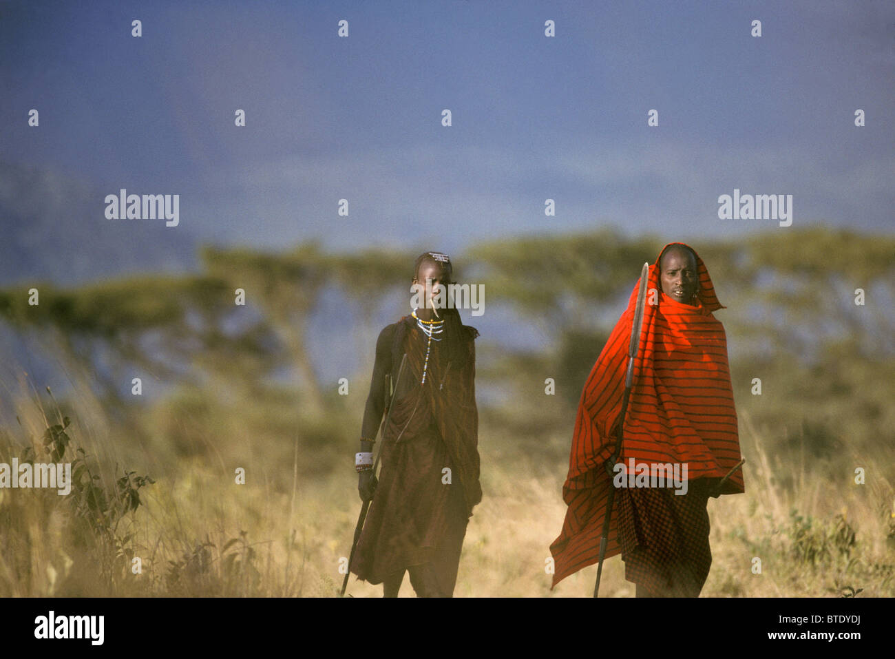 Masaai man and youth Stock Photo - Alamy