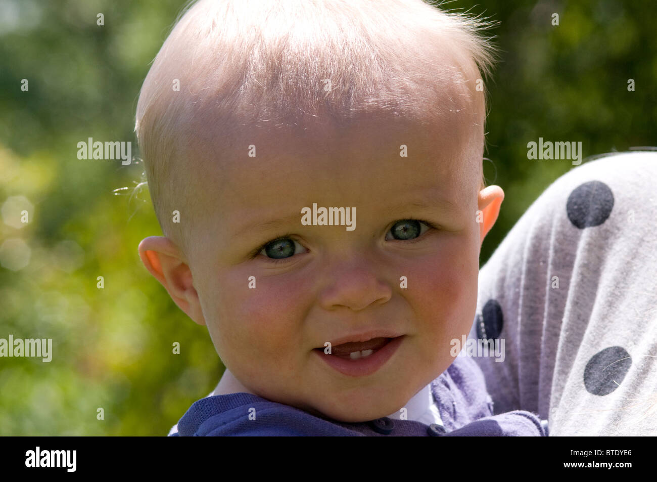 Portrait of a smiling baby boy Stock Photo - Alamy