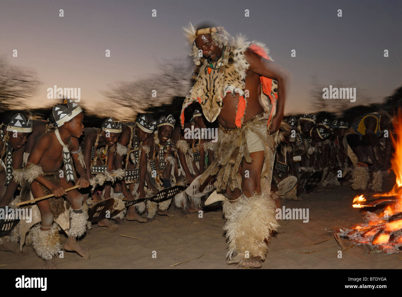 Abstract photo of Zulu dancers during a performance at dusk Stock Photo ...