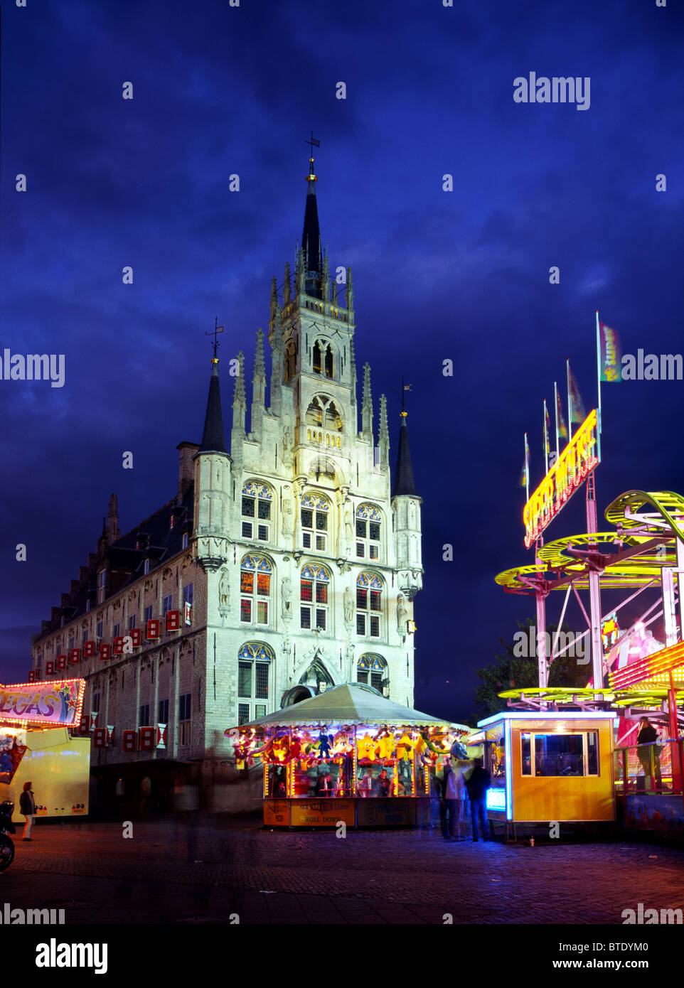 Gouda Town Hall & Funfair, Dusk Stock Photo - Alamy