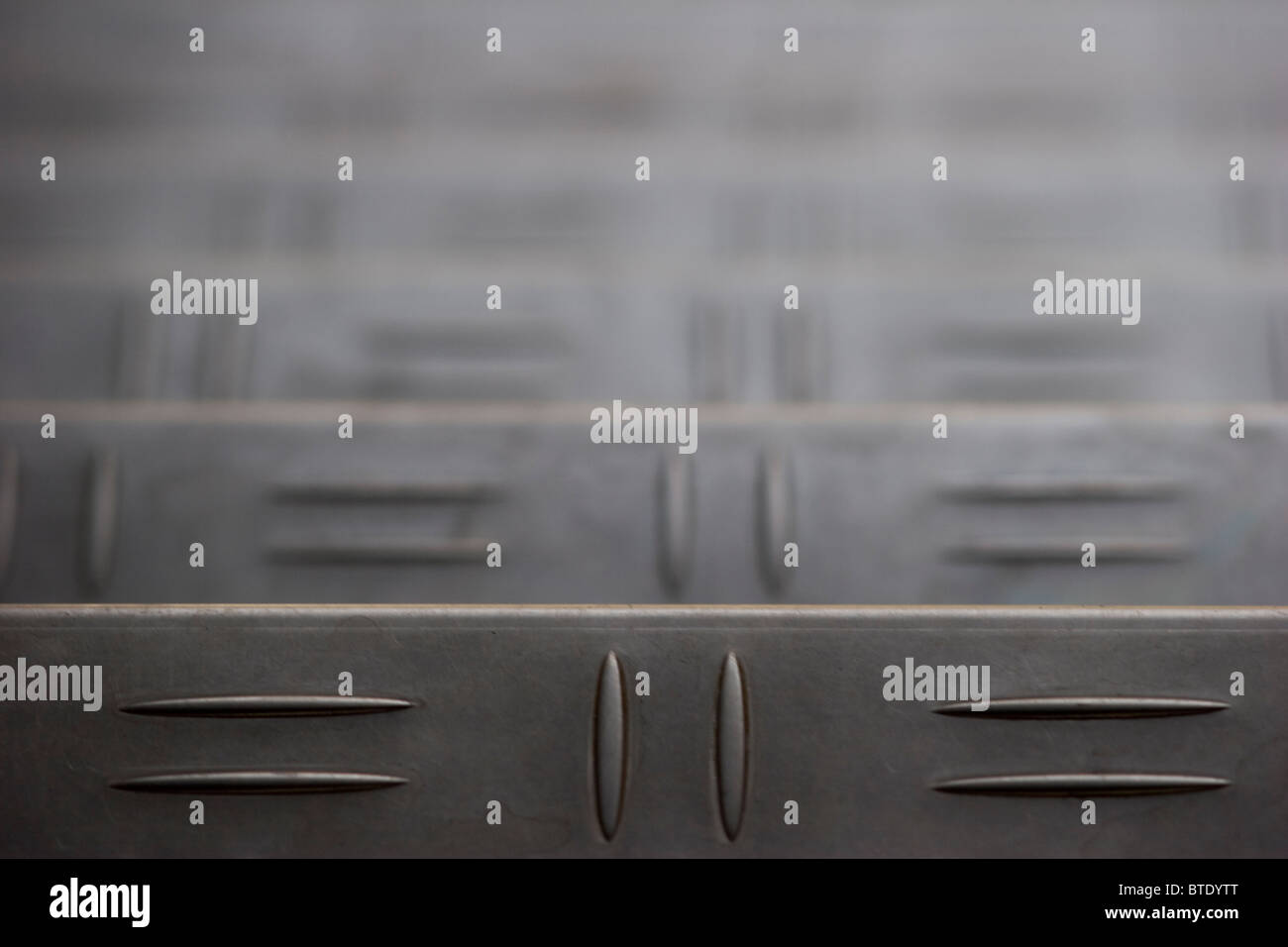 symmetrical pattern from stainless steel stairs Stock Photo - Alamy