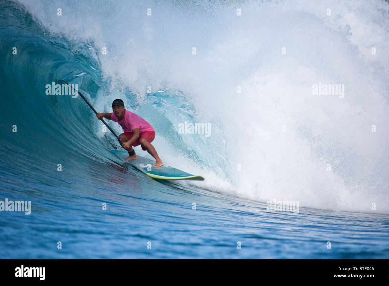 Man surfing in the tube of a wave Stock Photo - Alamy