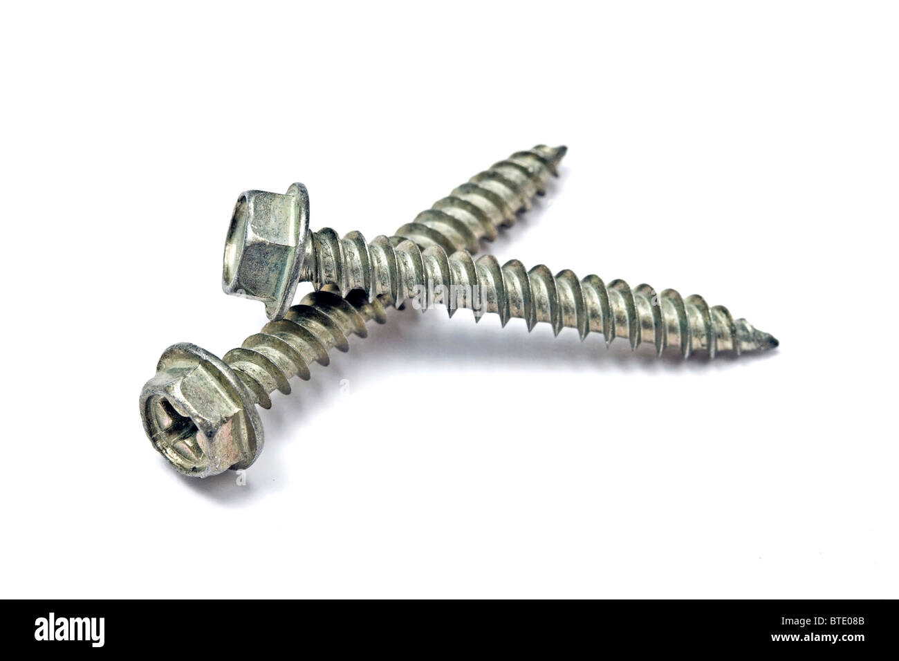 Two screws isolated on white background Stock Photo - Alamy