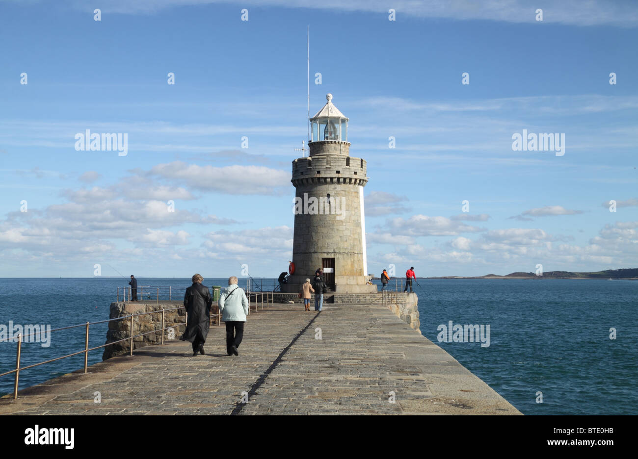 Lighthouse and pier at St Peter Port Guernsey Stock Photo - Alamy