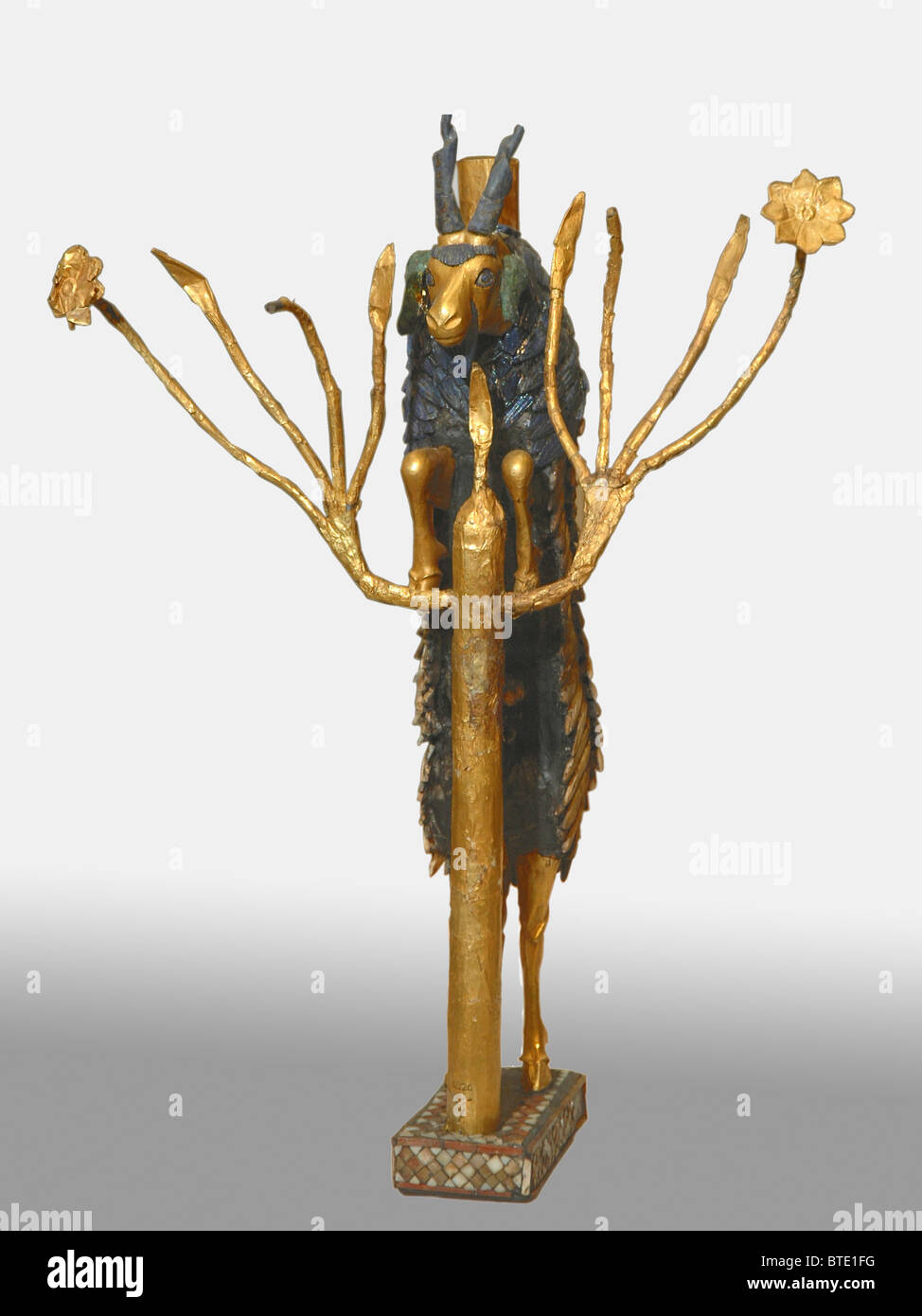 5240. GOLD COATED GOAT WITH HIS FORELEGS LEANING ON A TREE, REMINISENT ...