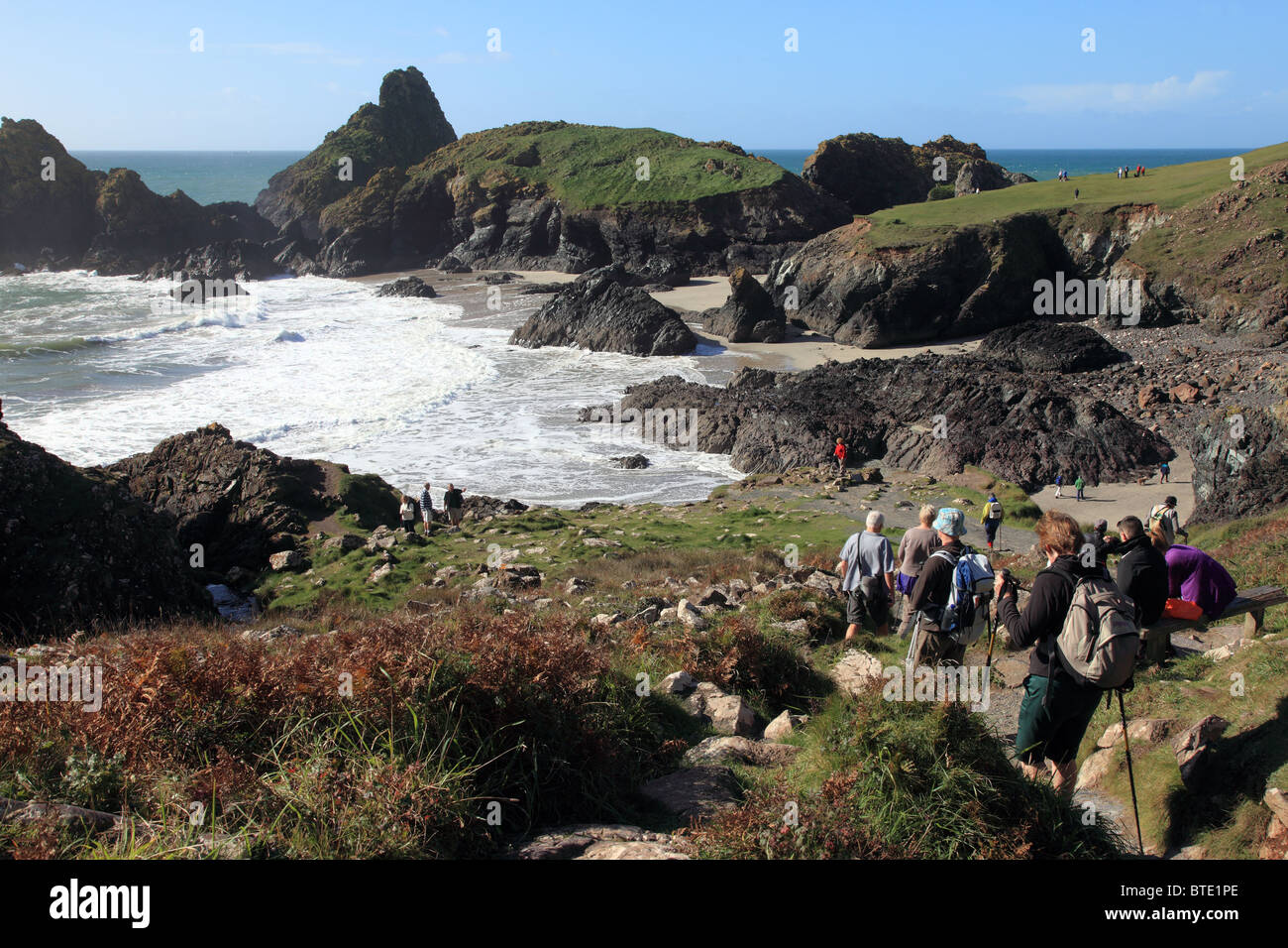 Walkers at Kynance Cove, Cornwall Stock Photo - Alamy