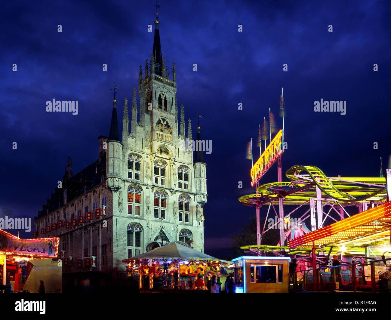 Gouda Town Hall & Funfair, Dusk Stock Photo - Alamy
