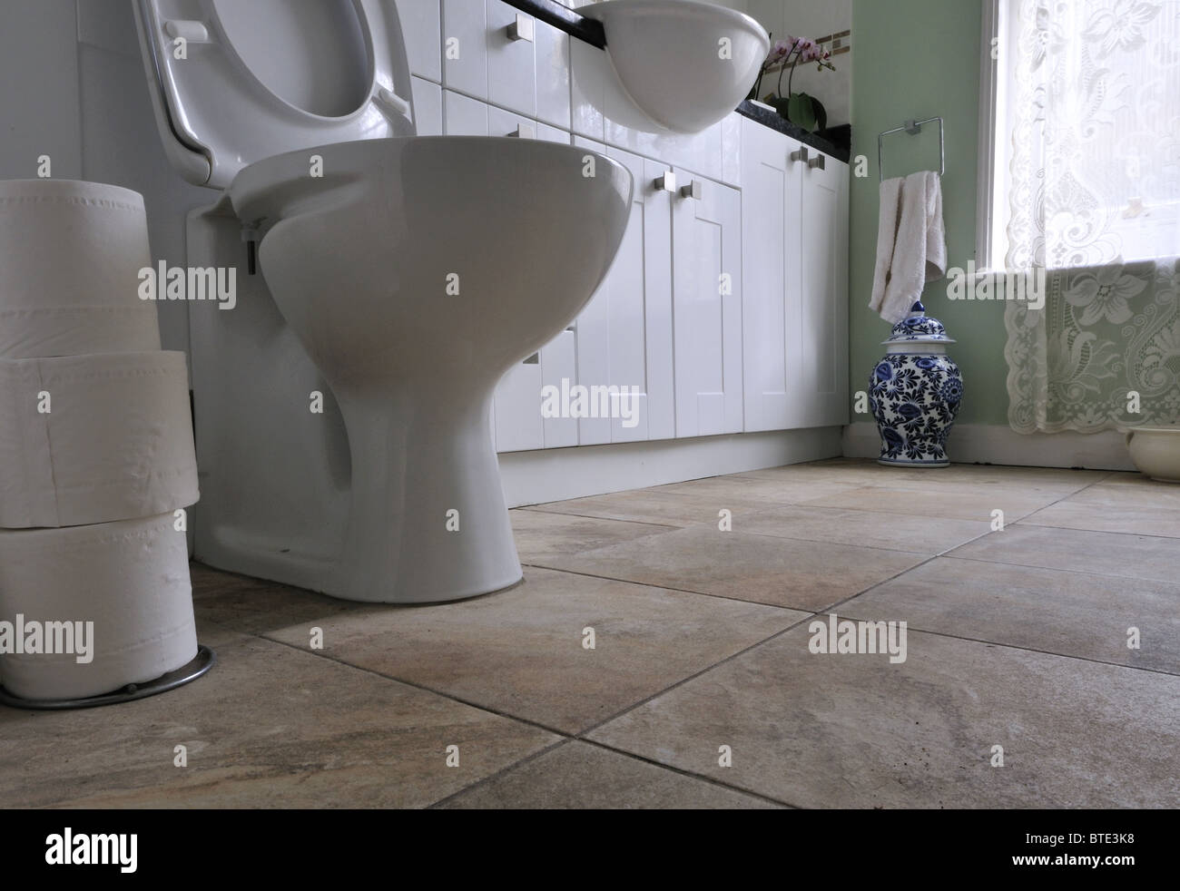 Bathroom ,low camera angle flooring ceramic tiles Stock Photo - Alamy