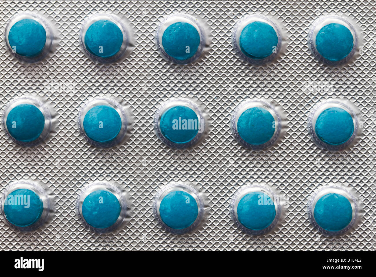 Texture of blue pills background Stock Photo - Alamy