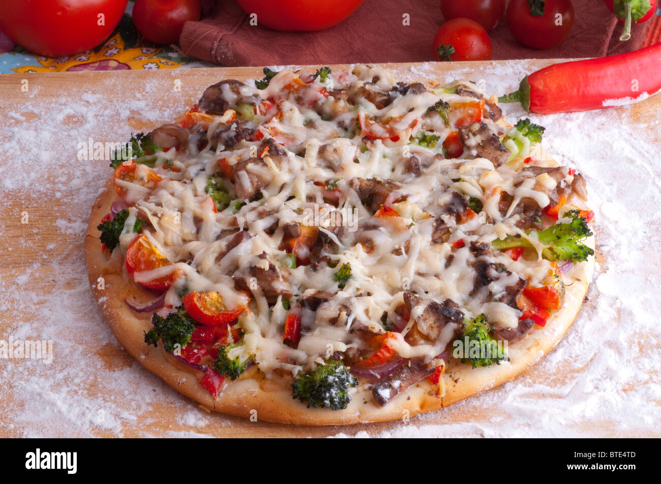 cheese and tomato pizza with rocket Stock Photo - Alamy