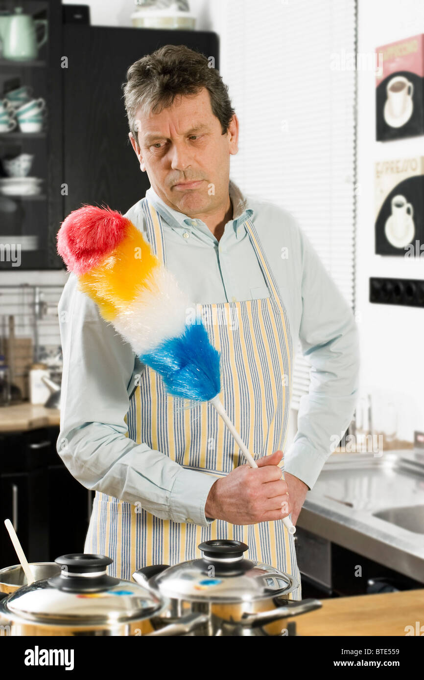 Man With Feather Duster High Resolution Stock Photography and Images ...
