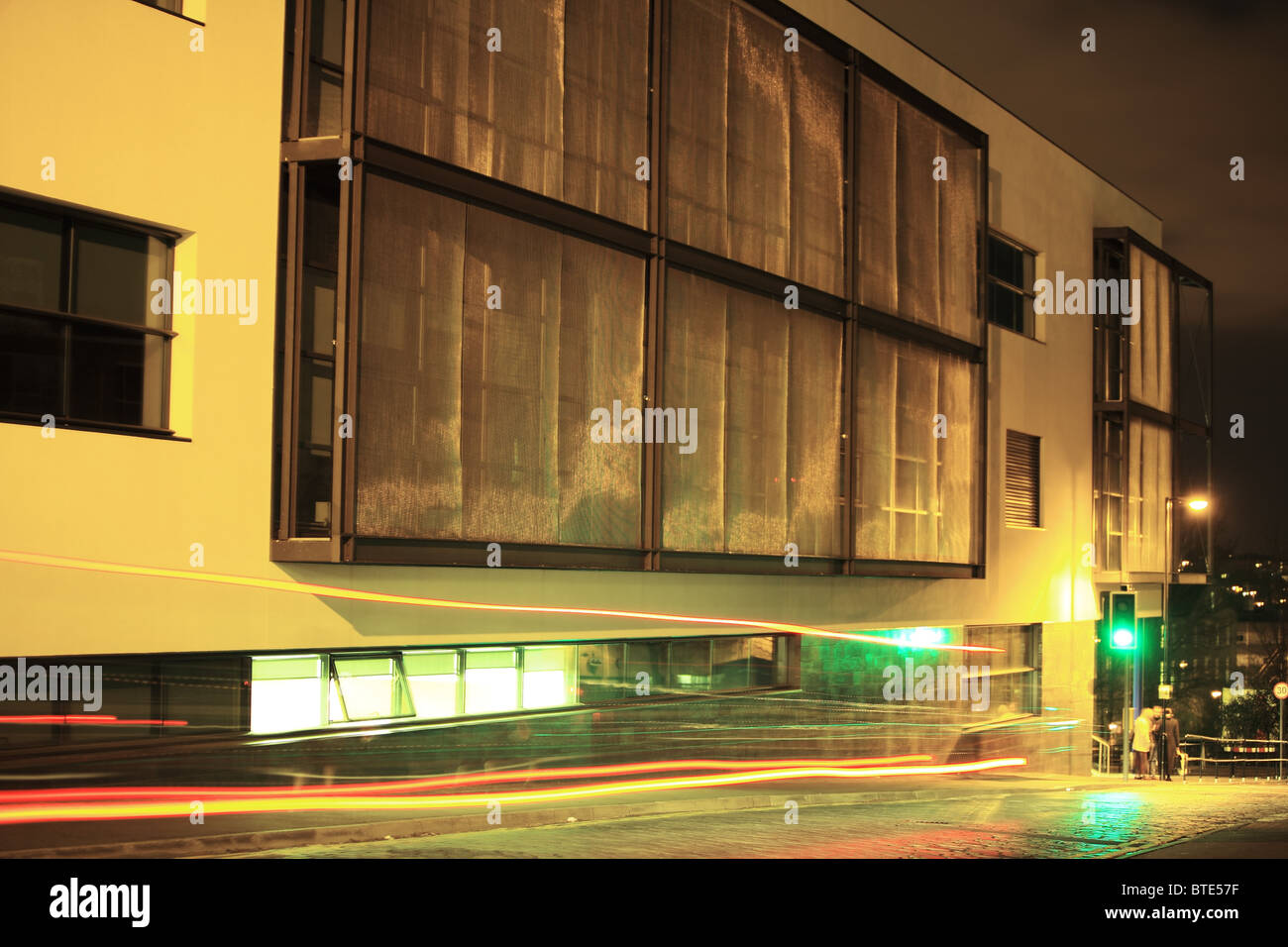 cars passes university building Stock Photo - Alamy