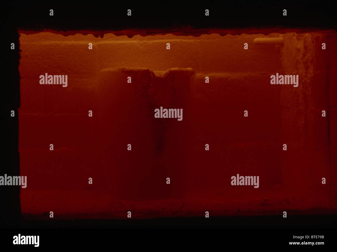 Gold being smelted in an urn in a Gold Kiln at Johannesburg's Gold Reef ...