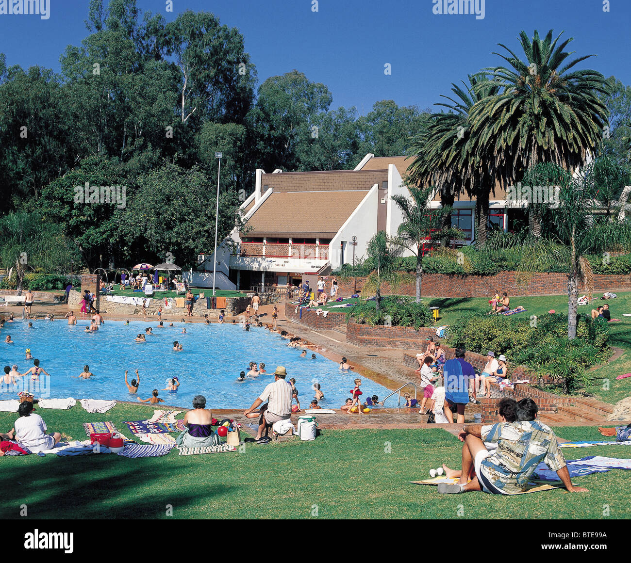 Holiday makers enjoy the hot mineral bath in Badplaas Stock Photo - Alamy