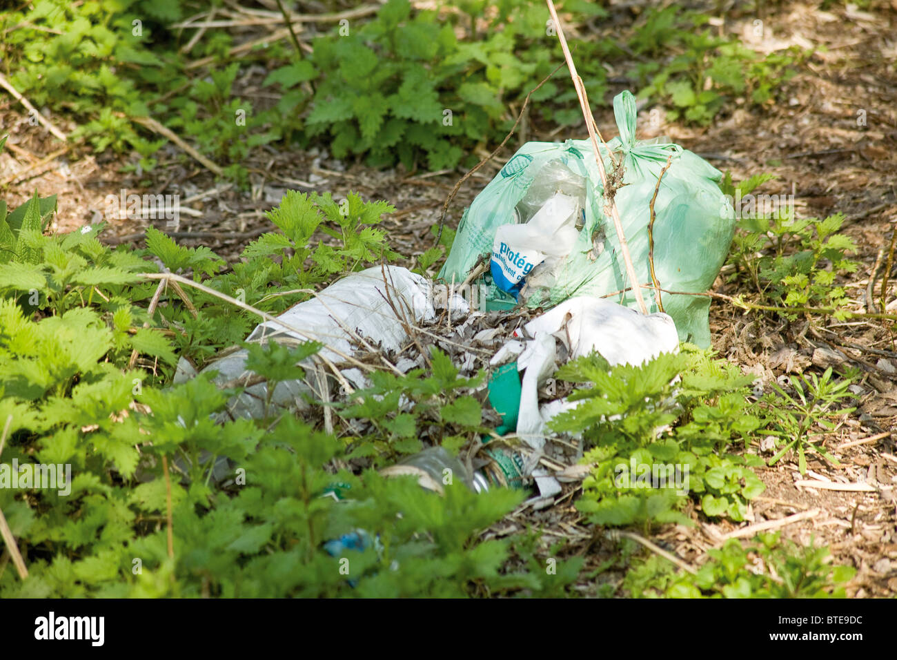 Garbage dumped outdoors Stock Photo - Alamy
