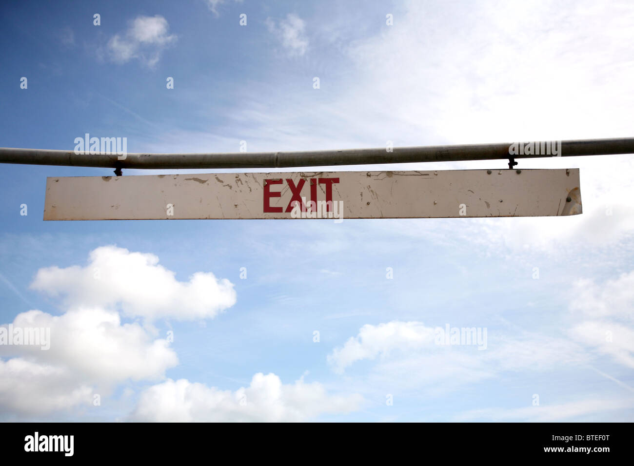 An overhead exit sign Stock Photo - Alamy