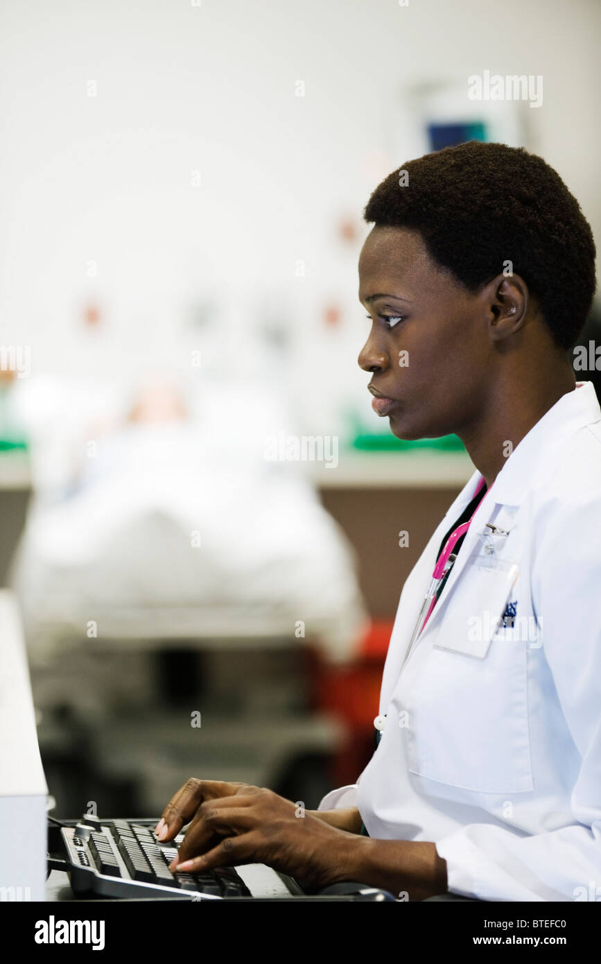 Healthcare worker using computer Stock Photo - Alamy