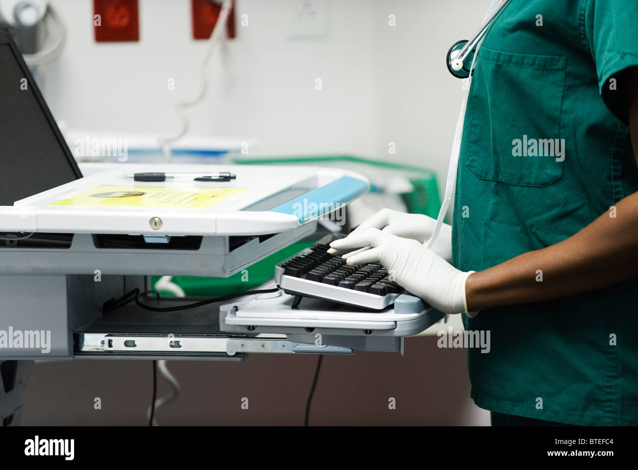Healthcare worker using computer Stock Photo - Alamy