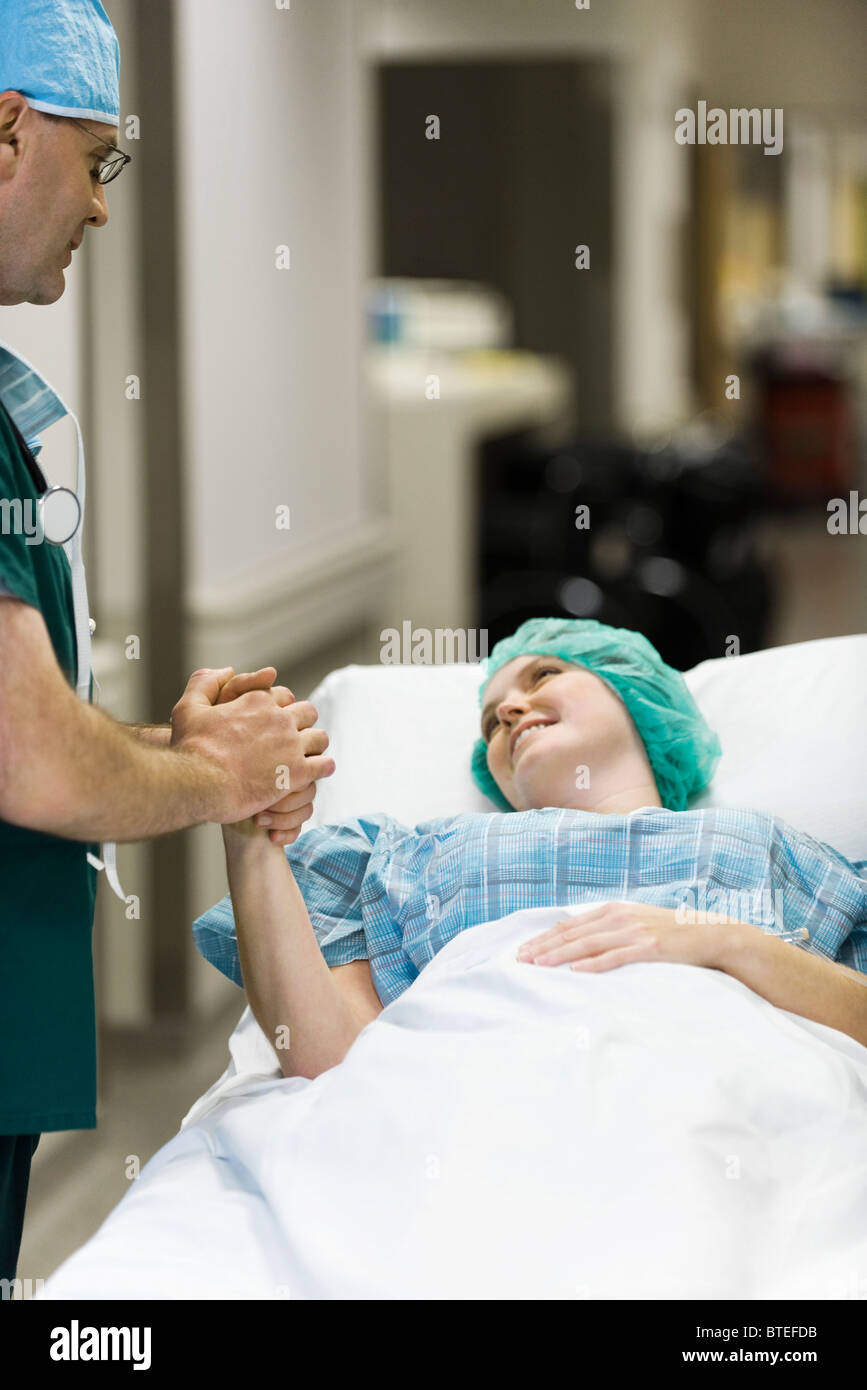 Doctor reassuring patient Stock Photo - Alamy