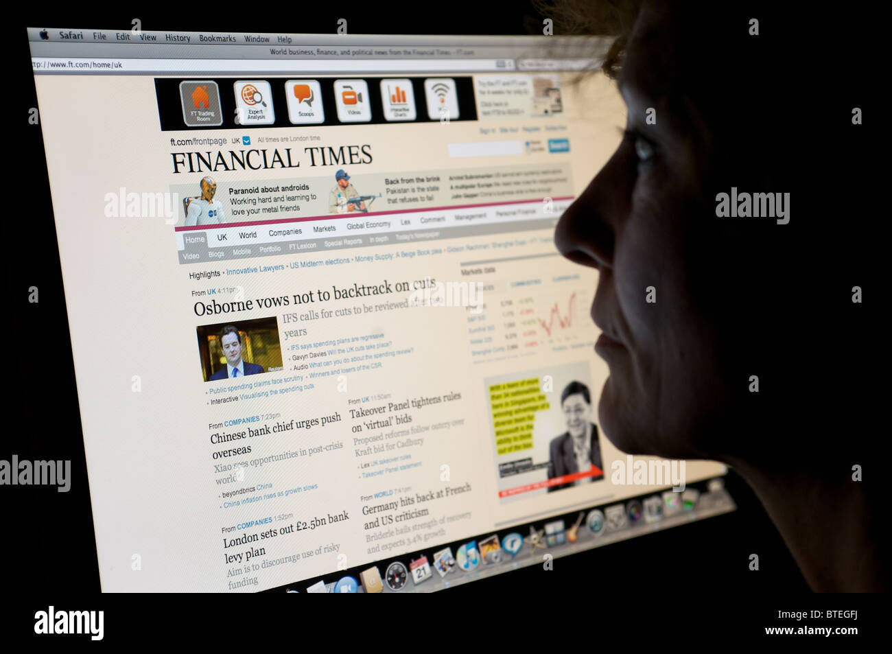 Woman reading financial times hi-res stock photography and images - Alamy