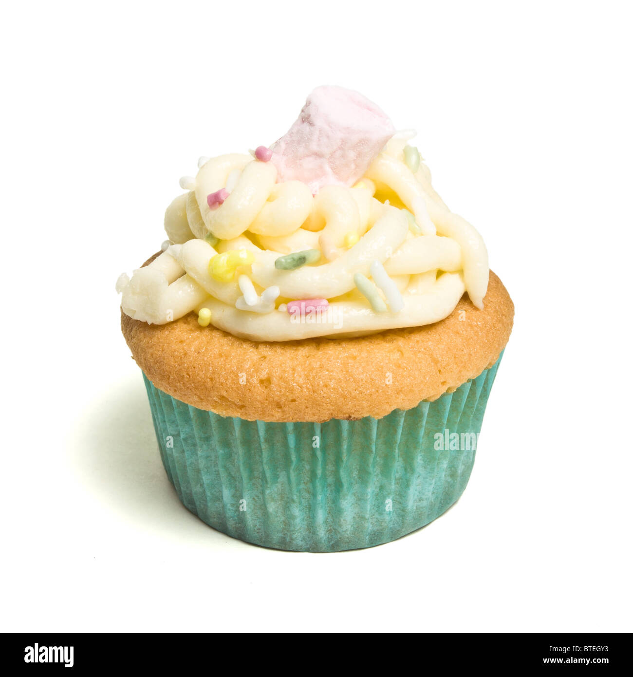 Unique homemade single cupcake from low perspective isolated against ...