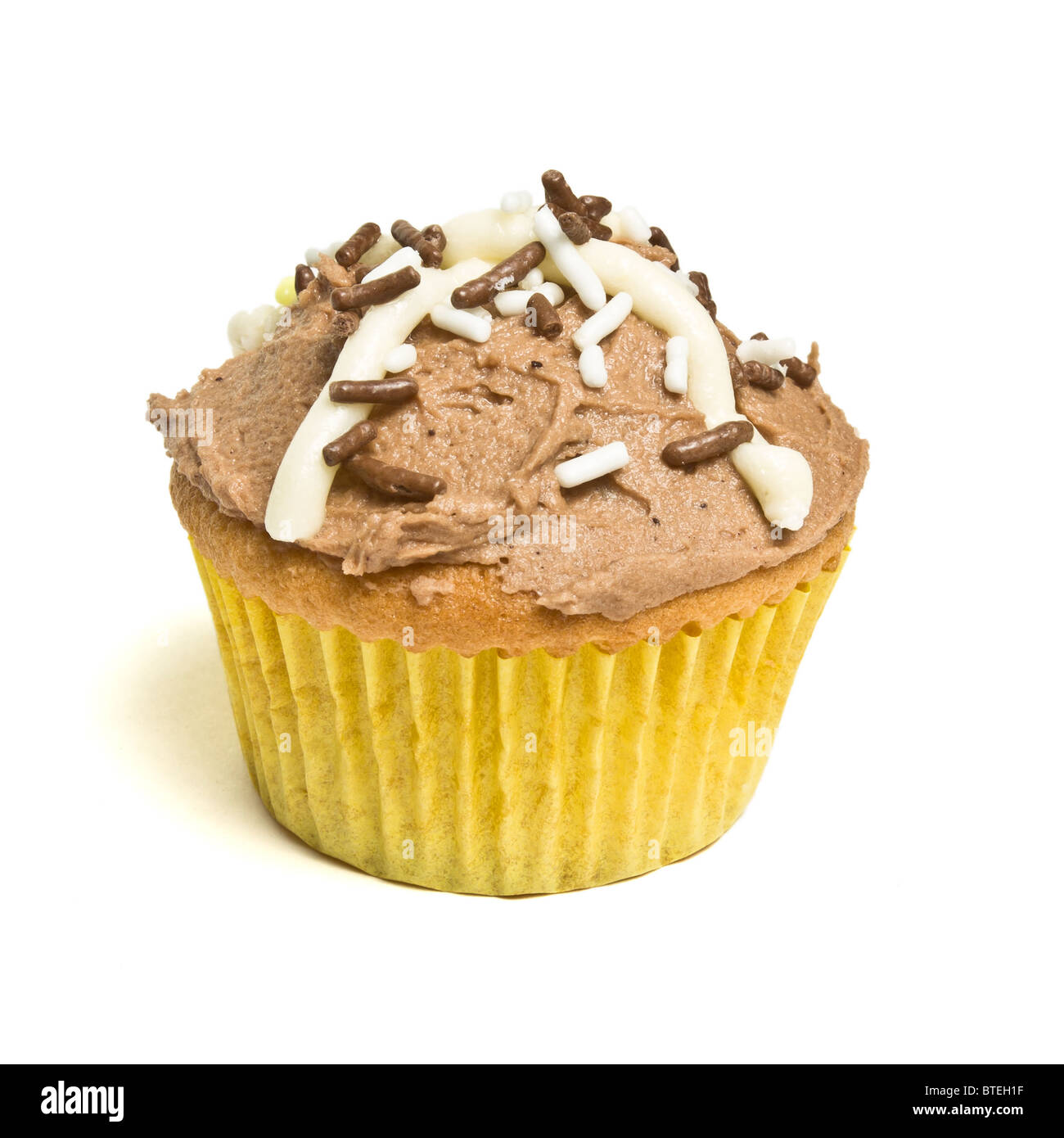 Unique homemade single cupcake from low perspective isolated against ...