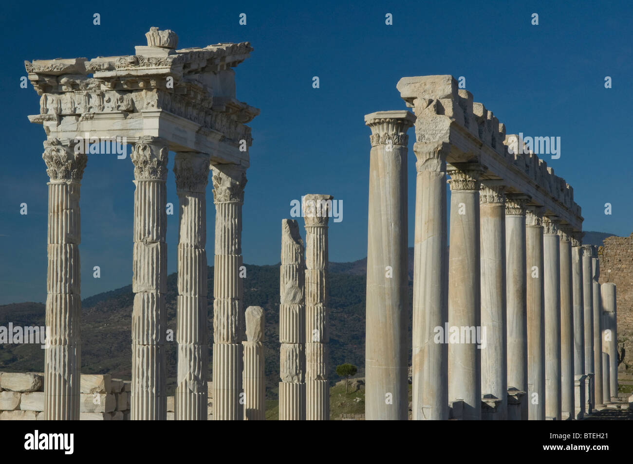 Corinthian columns of Temple of Trajan, Greek ruins on the acropolis of ...