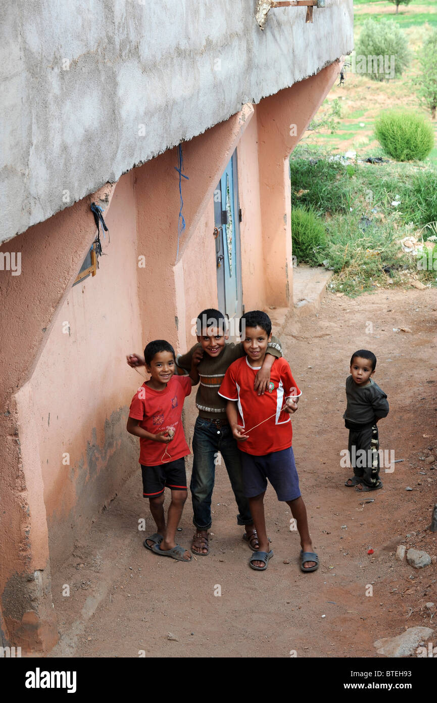 Local children having fun playing outside Stock Photo - Alamy