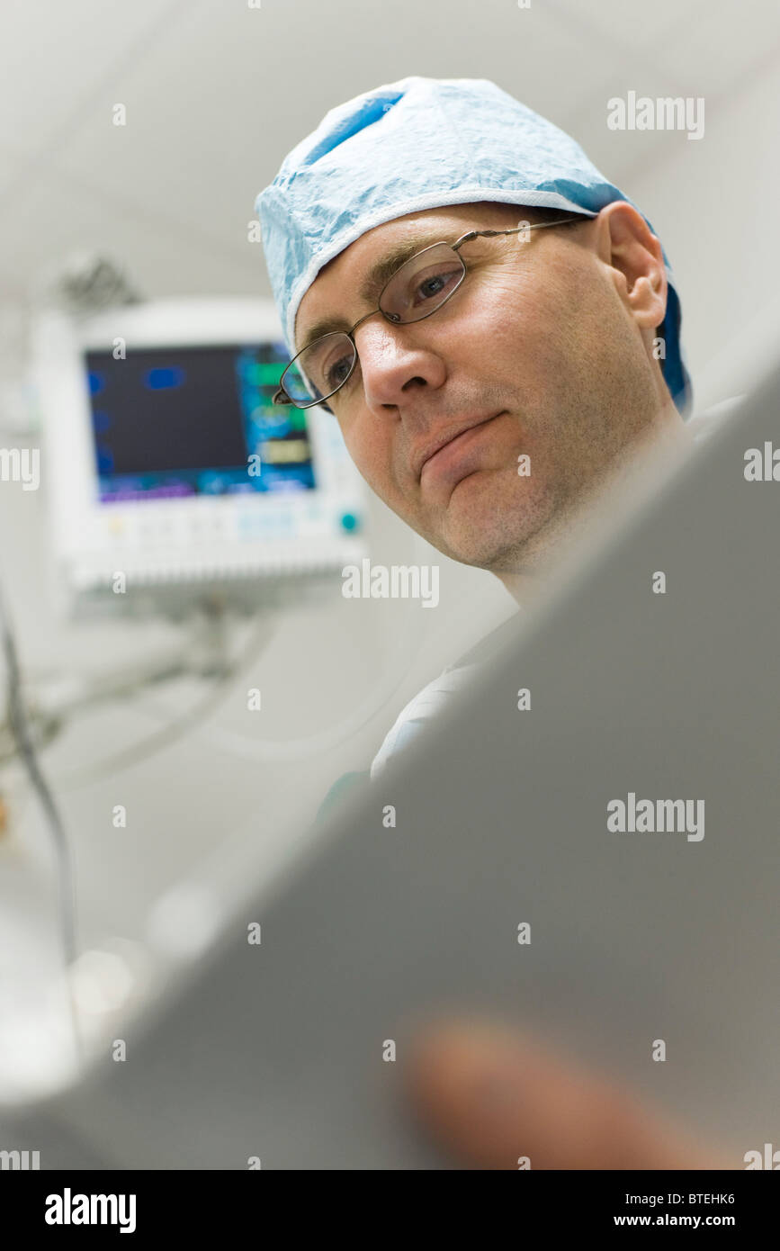 Healthcare worker focused on work Stock Photo - Alamy