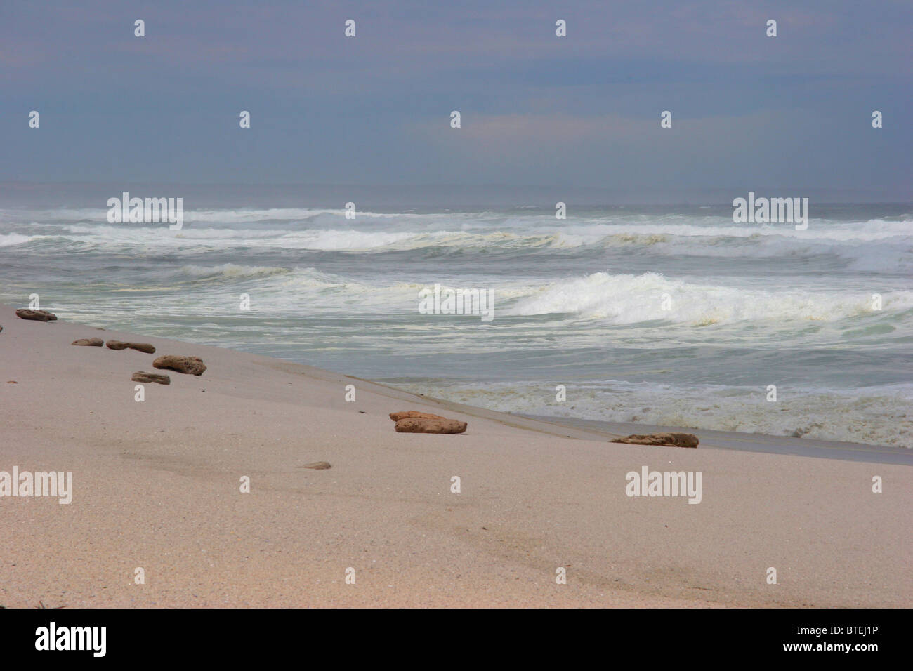 Seascape and beach at Pearl Bay Stock Photo - Alamy