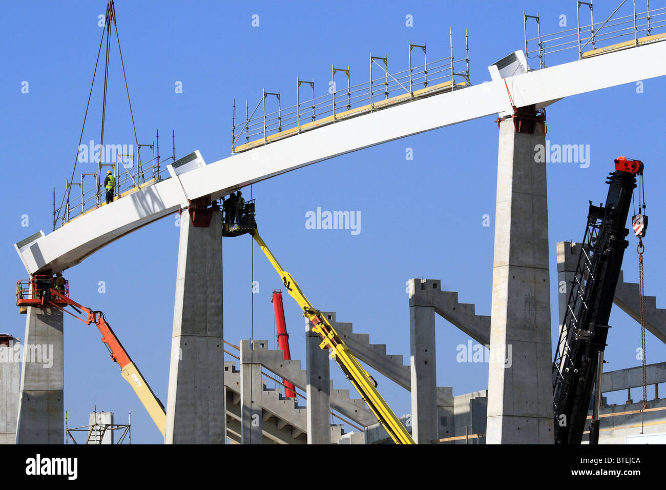 Construction of a modern arena type stadium Stock Photo - Alamy