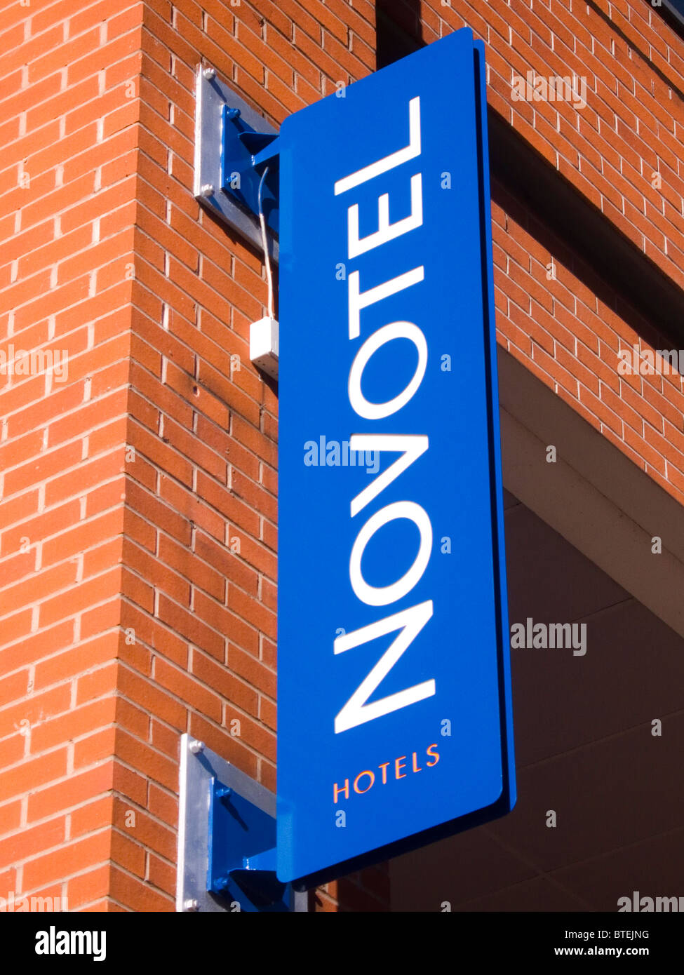 Novotel sign on wall in Manchester UK Stock Photo - Alamy