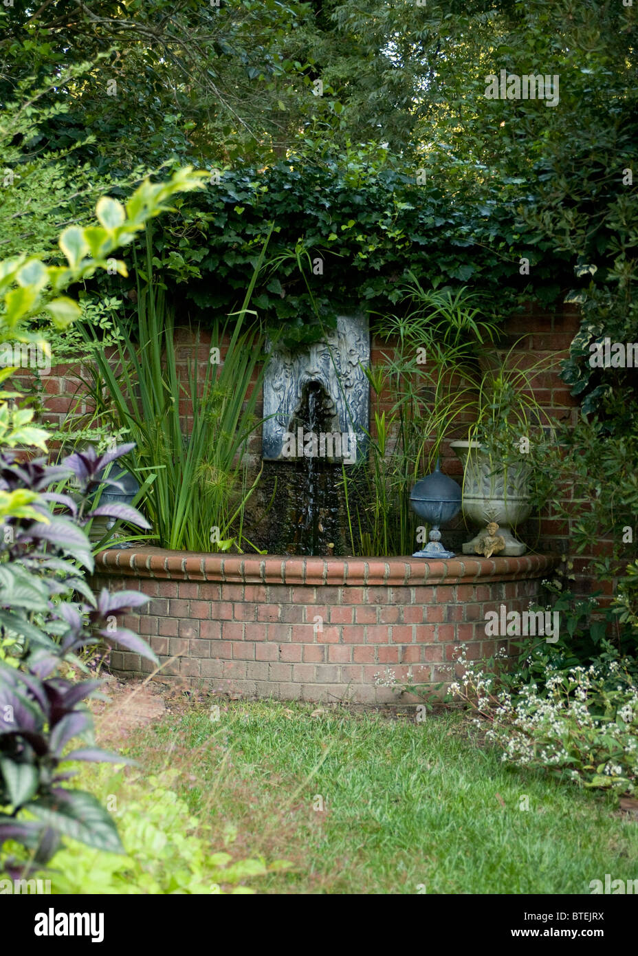 Water feature in the garden Stock Photo - Alamy