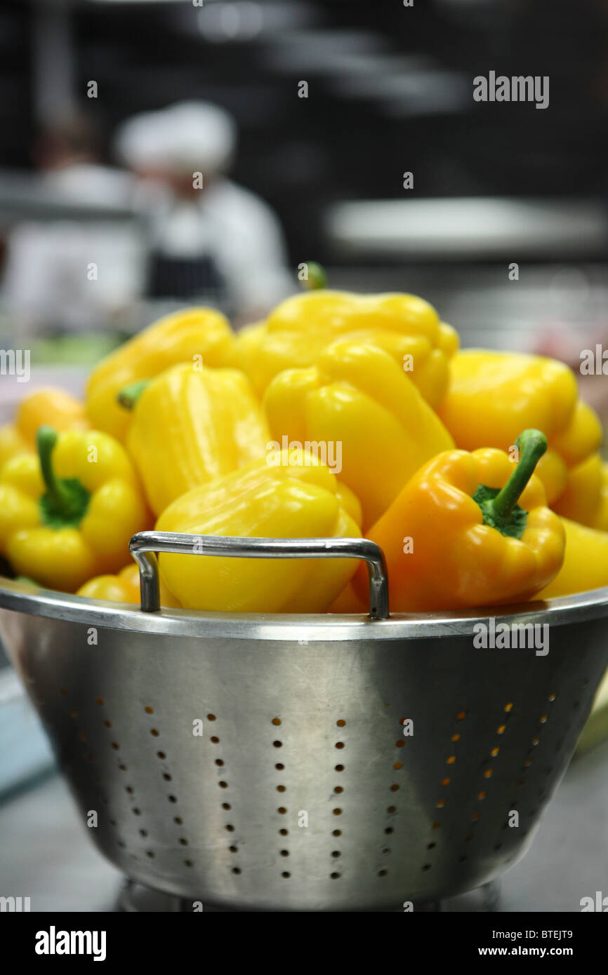 bowl of yellow peppers in kitchen Stock Photo - Alamy