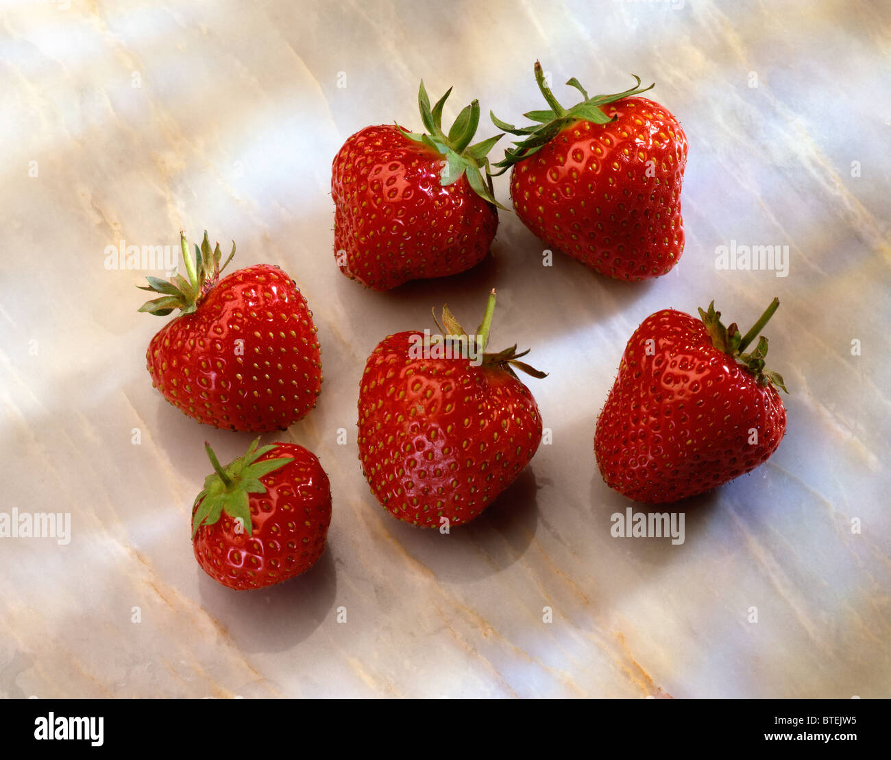 Six strawberries hi-res stock photography and images - Alamy