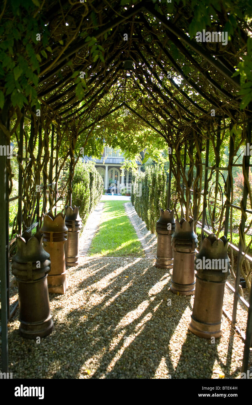 View through an elaborate garden trellis Stock Photo - Alamy